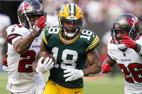 Quarterback Aaron Rodgers throws pair of touchdown passes as Green Bay ...